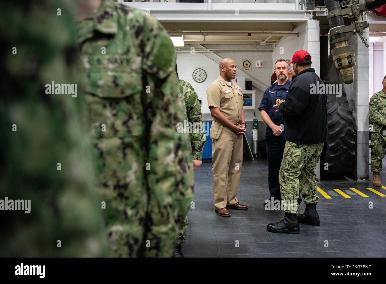 Attachés from foreign militaries observe a training evolution at USS ...