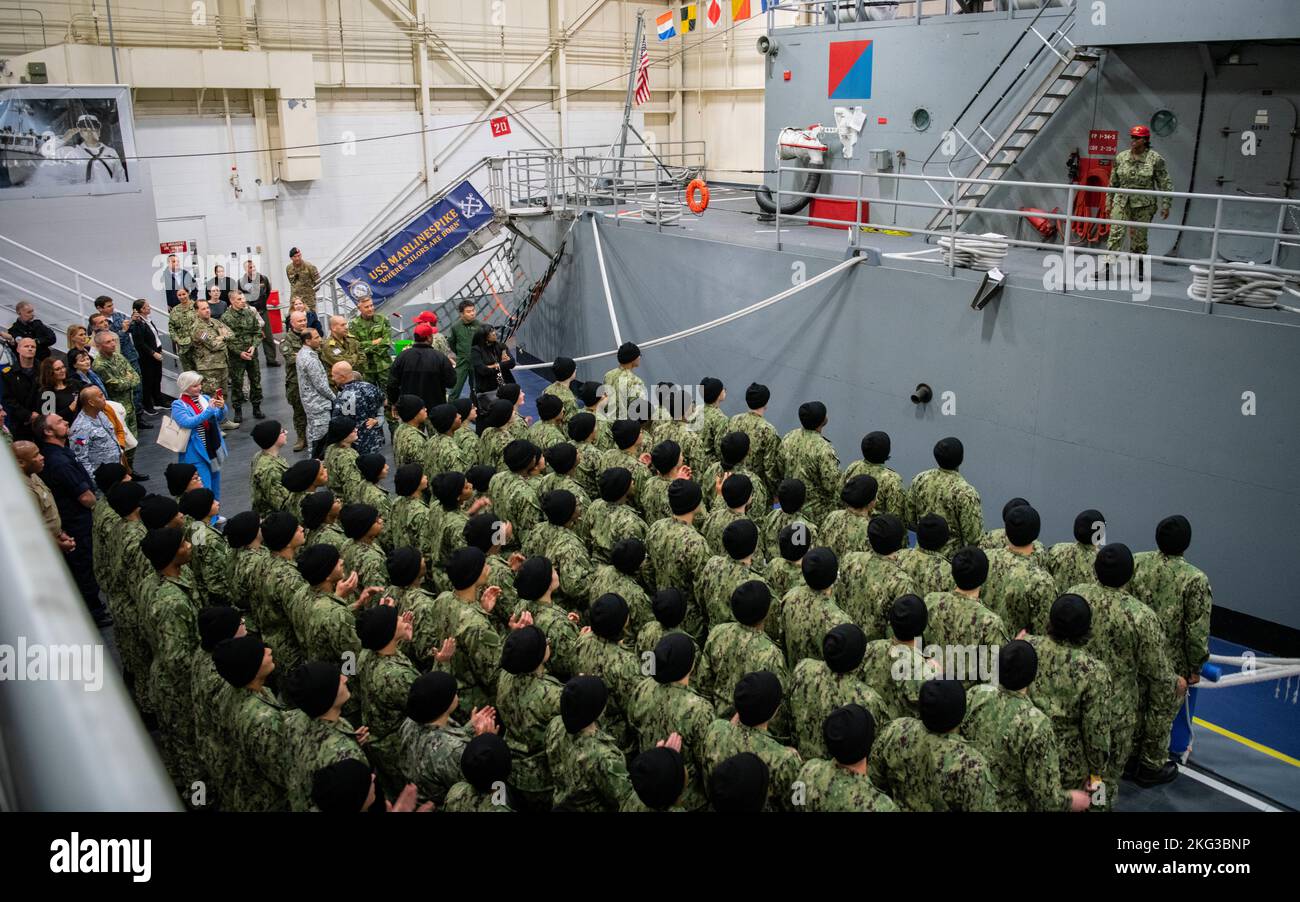 Attachés from foreign militaries observe a training evolution at USS ...