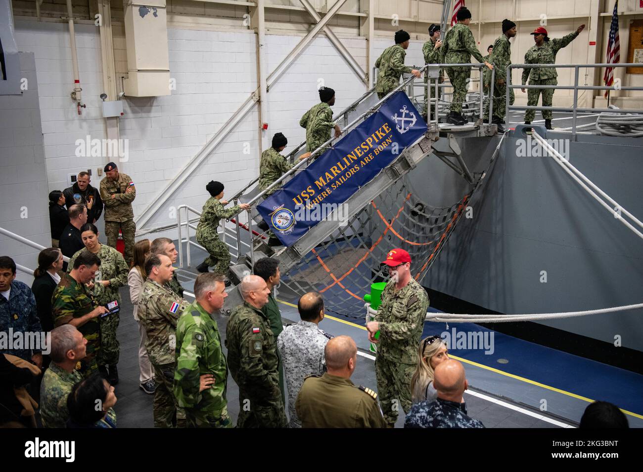 Attachés from foreign militaries observe a training evolution at USS ...