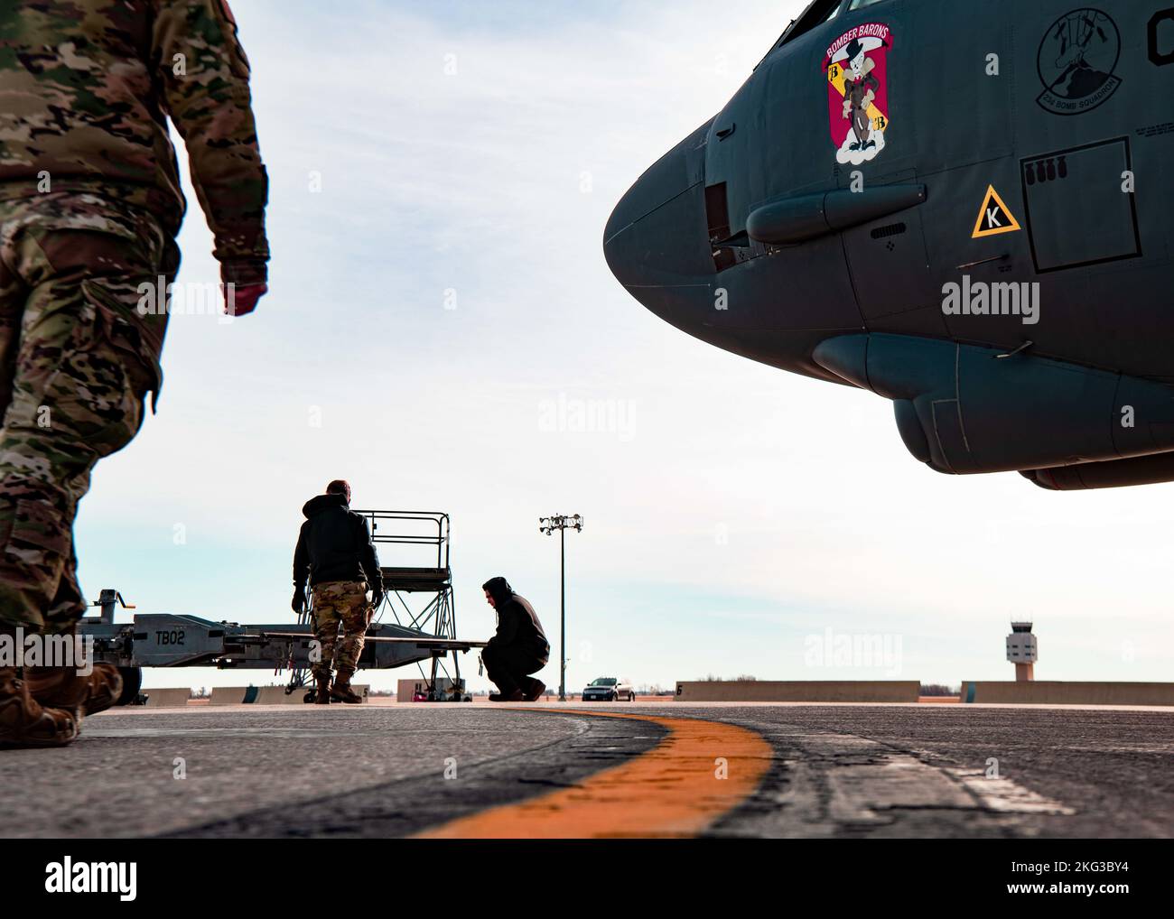 Two B-52H Stratofortresses fly over the flightline before coming in for ...