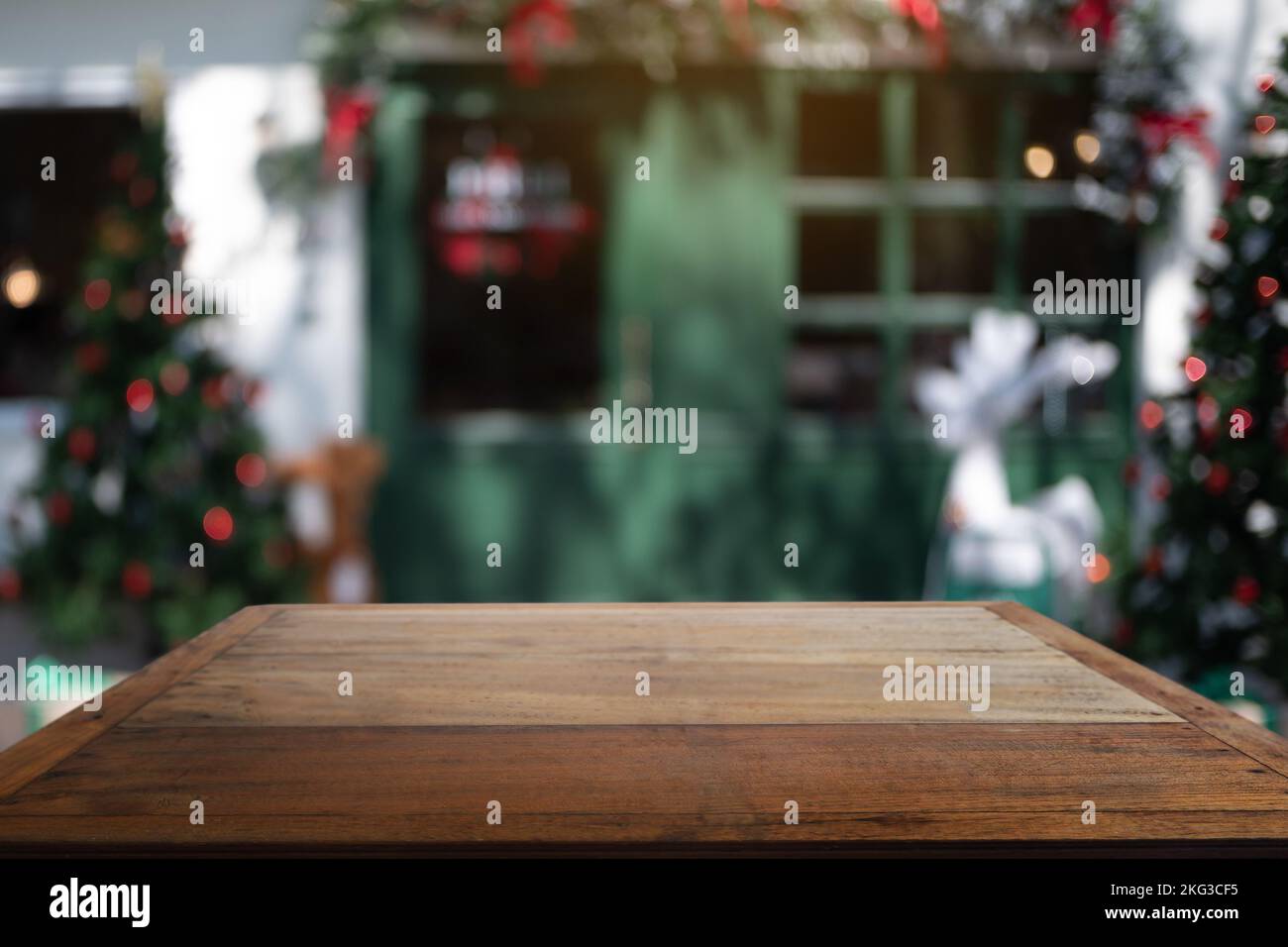 Empty wooden table in front of abstract blurred Cafe, restaurant, house ...