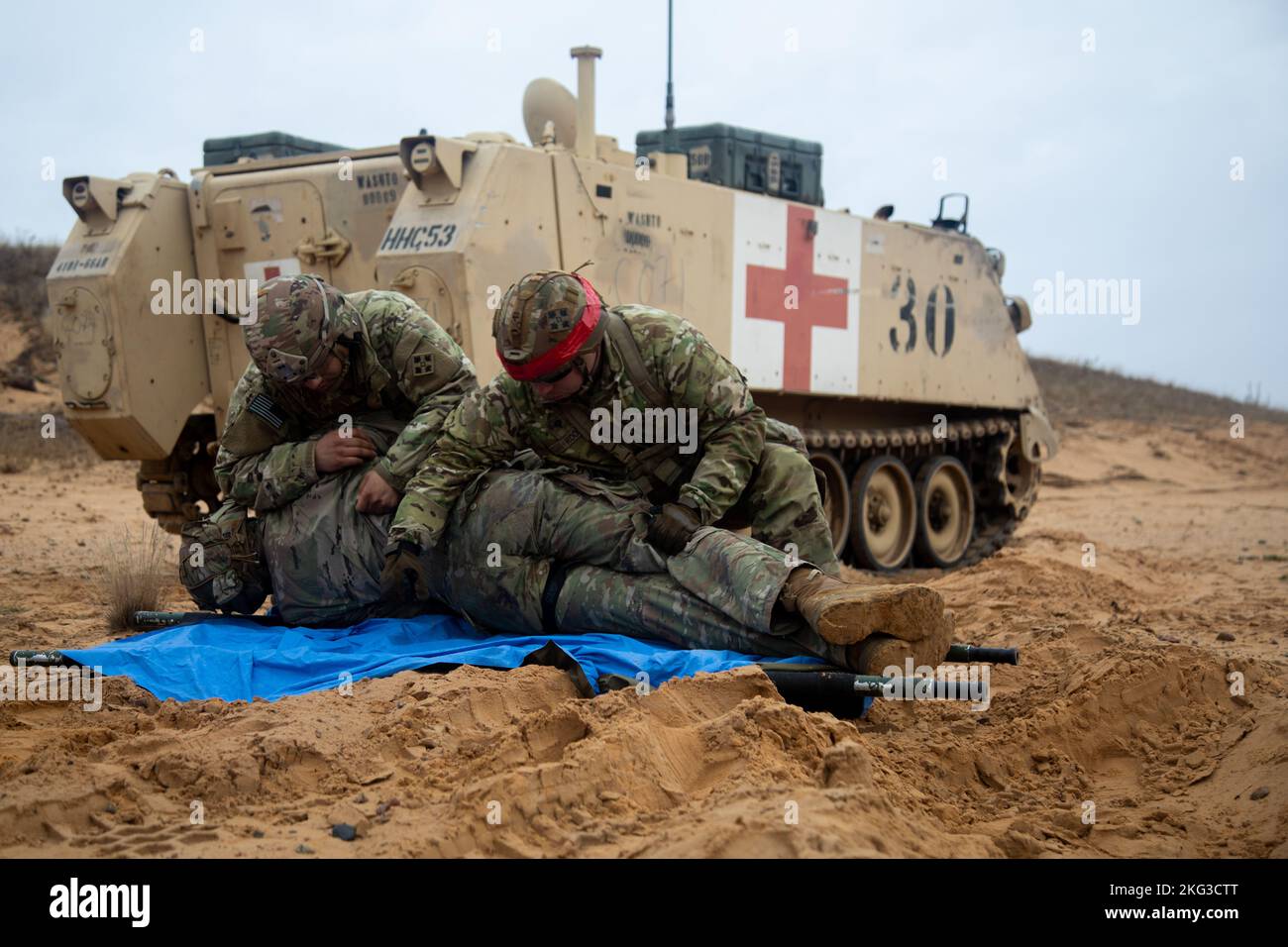 U.S. Army Sgt. Quentin A. Mendez, left, and Spc. Isaiah J. Rood, right ...