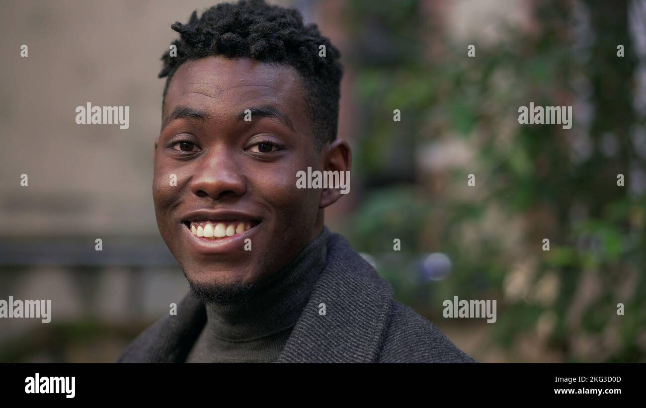 Happy satisfied black African portrait face close-up smile Stock Photo ...
