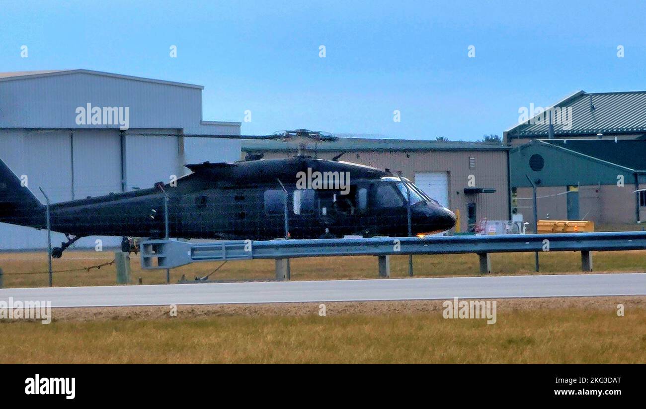 An aircrew with the Minnesota National Guard operates a UH-60 Black ...