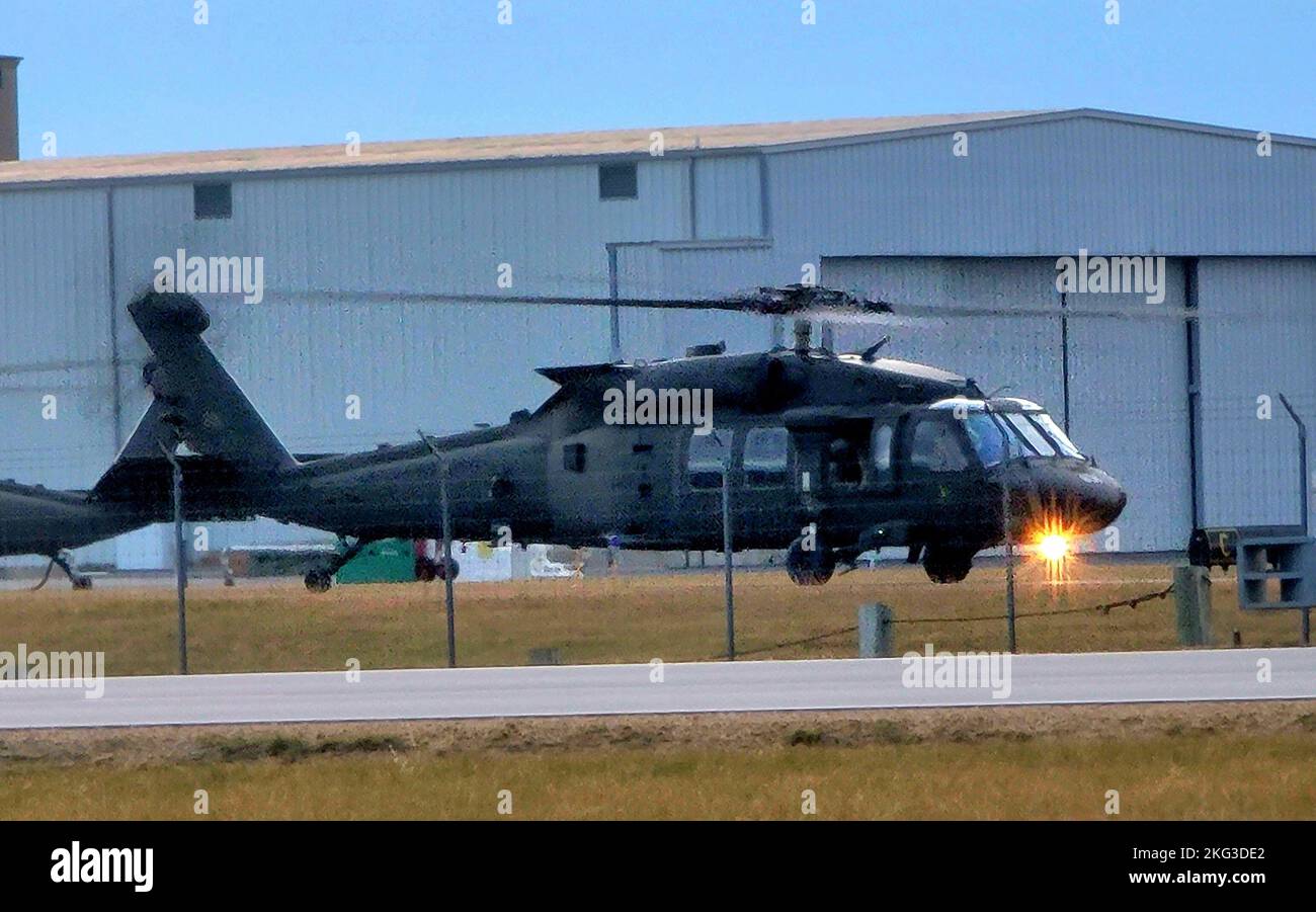 An aircrew with the Minnesota National Guard operates a UH-60 Black ...