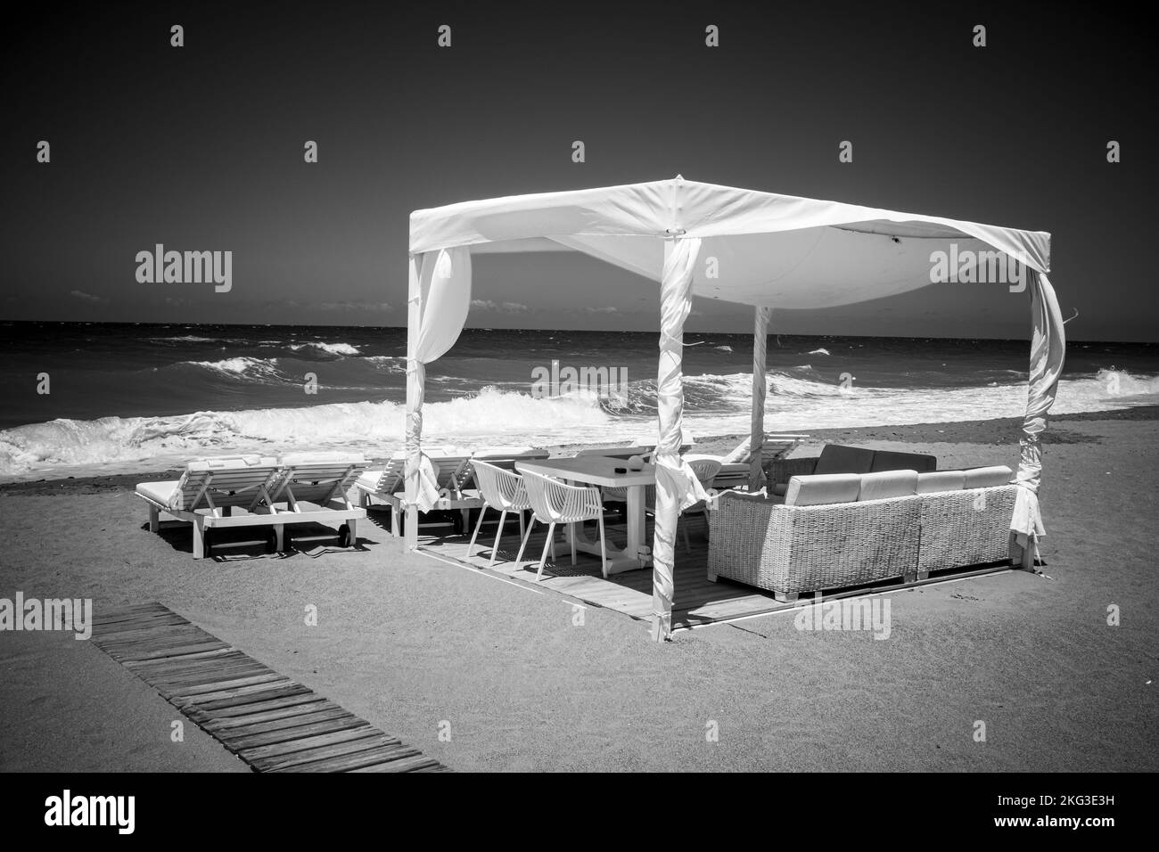 A grayscale shot of a beach in Crete, Greece Stock Photo - Alamy