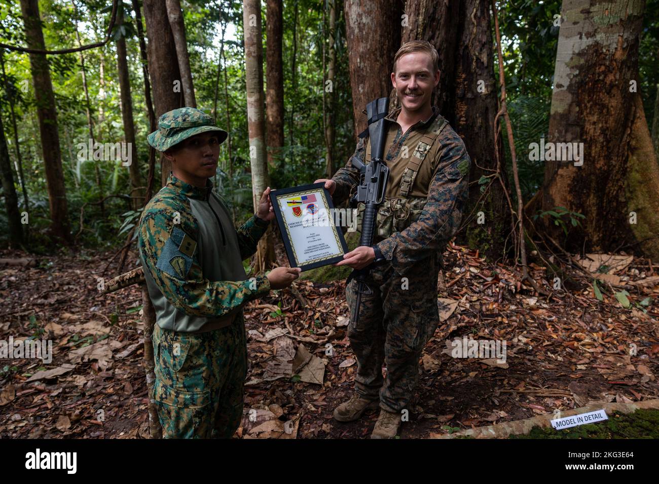 U.S. Marine Corps Capt. Luke Jackson, right, an expeditionary ground ...