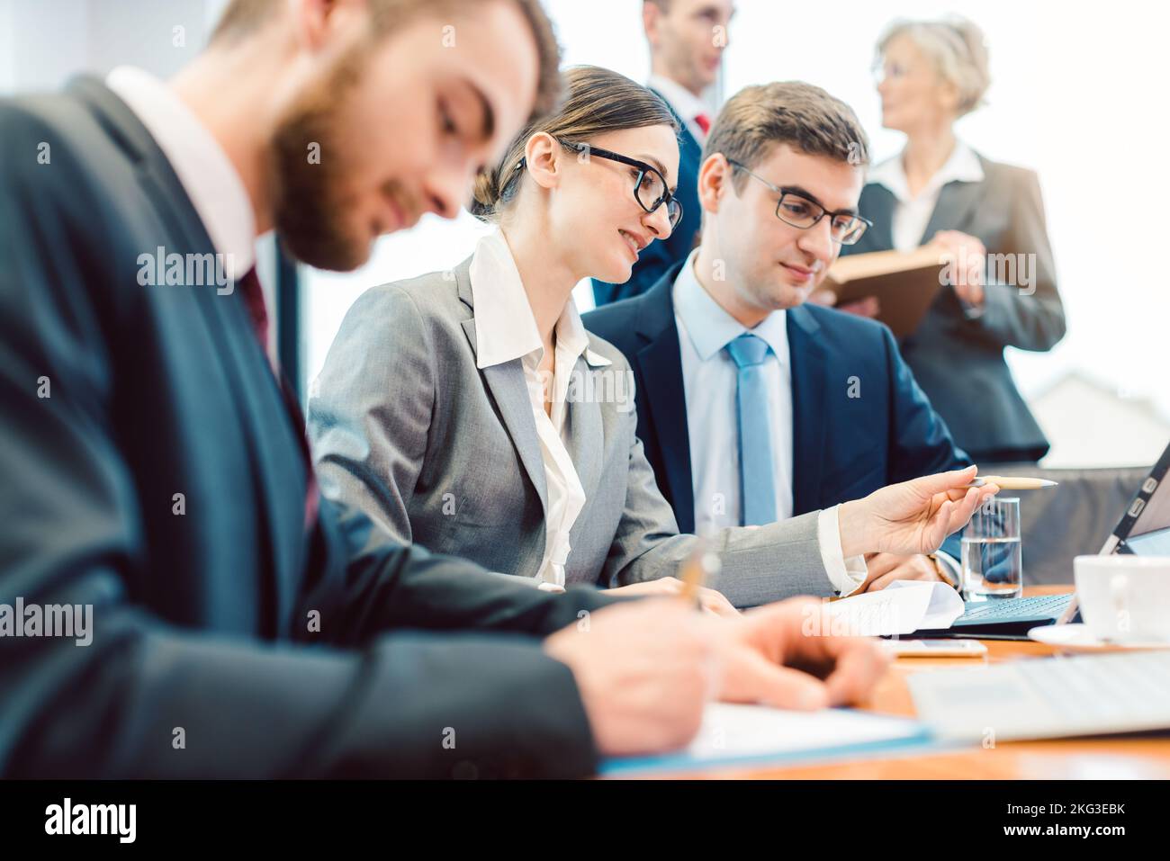Business people in team meeting collaborating Stock Photo - Alamy