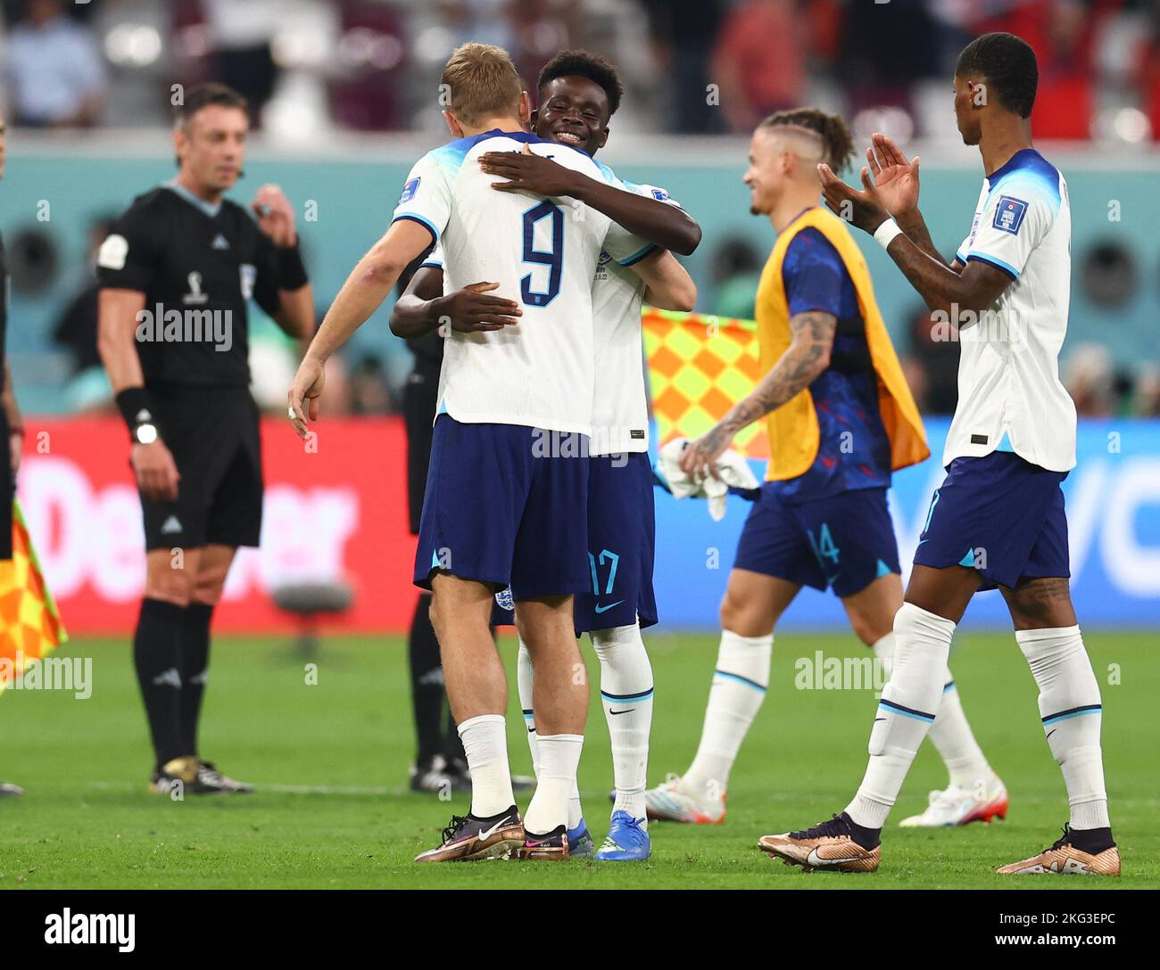 Doha, Qatar. 21st Nov, 2022. Harry Kane of England congratulates Bukayo ...
