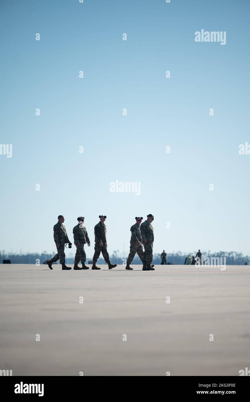 U.S. Airmen prepare for Checkered Flag 23-1 as they walk across the ...