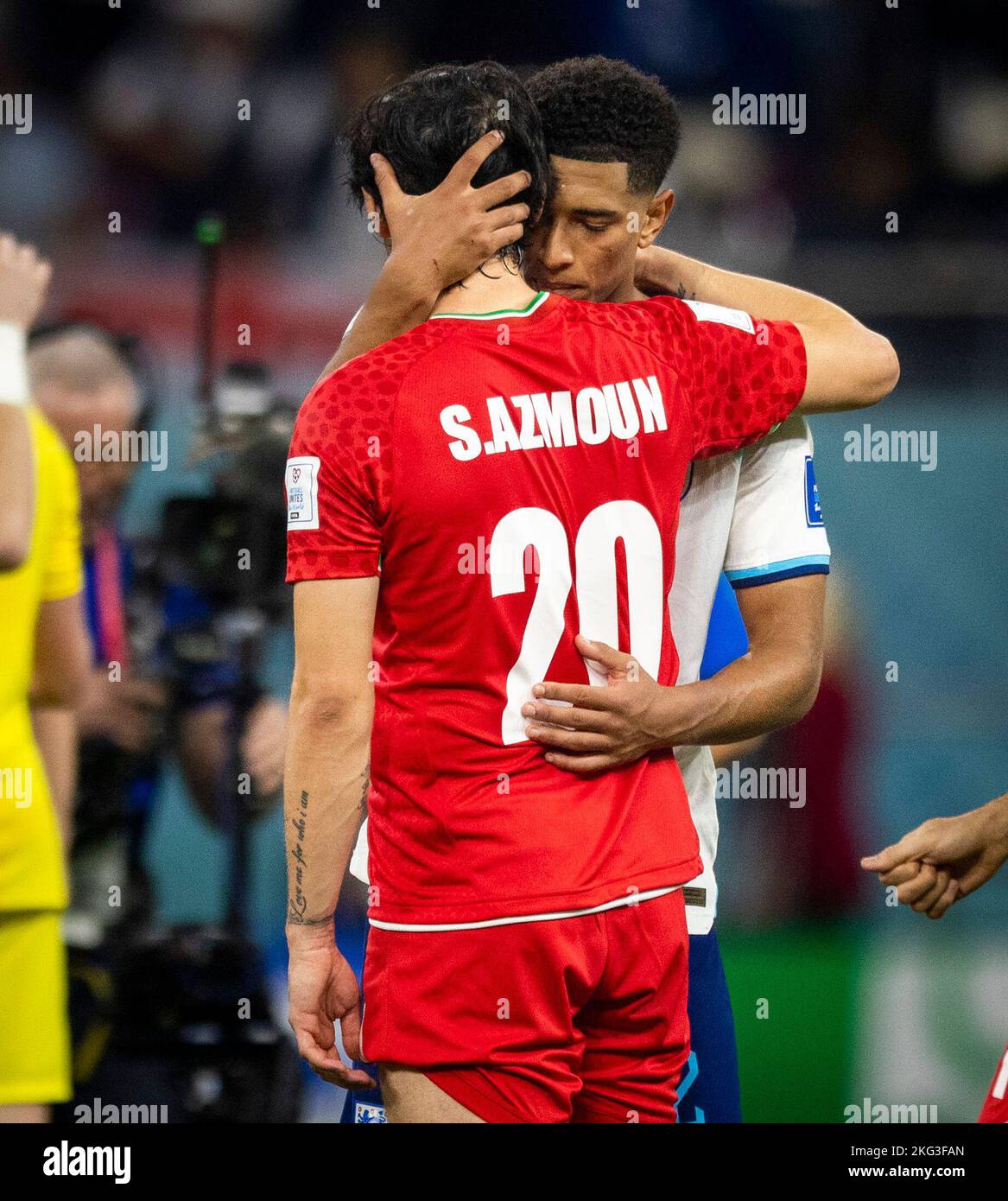 Doha, Qatar. 21st Nov, 2022. Jude Bellingham (England) hugs Sardar ...