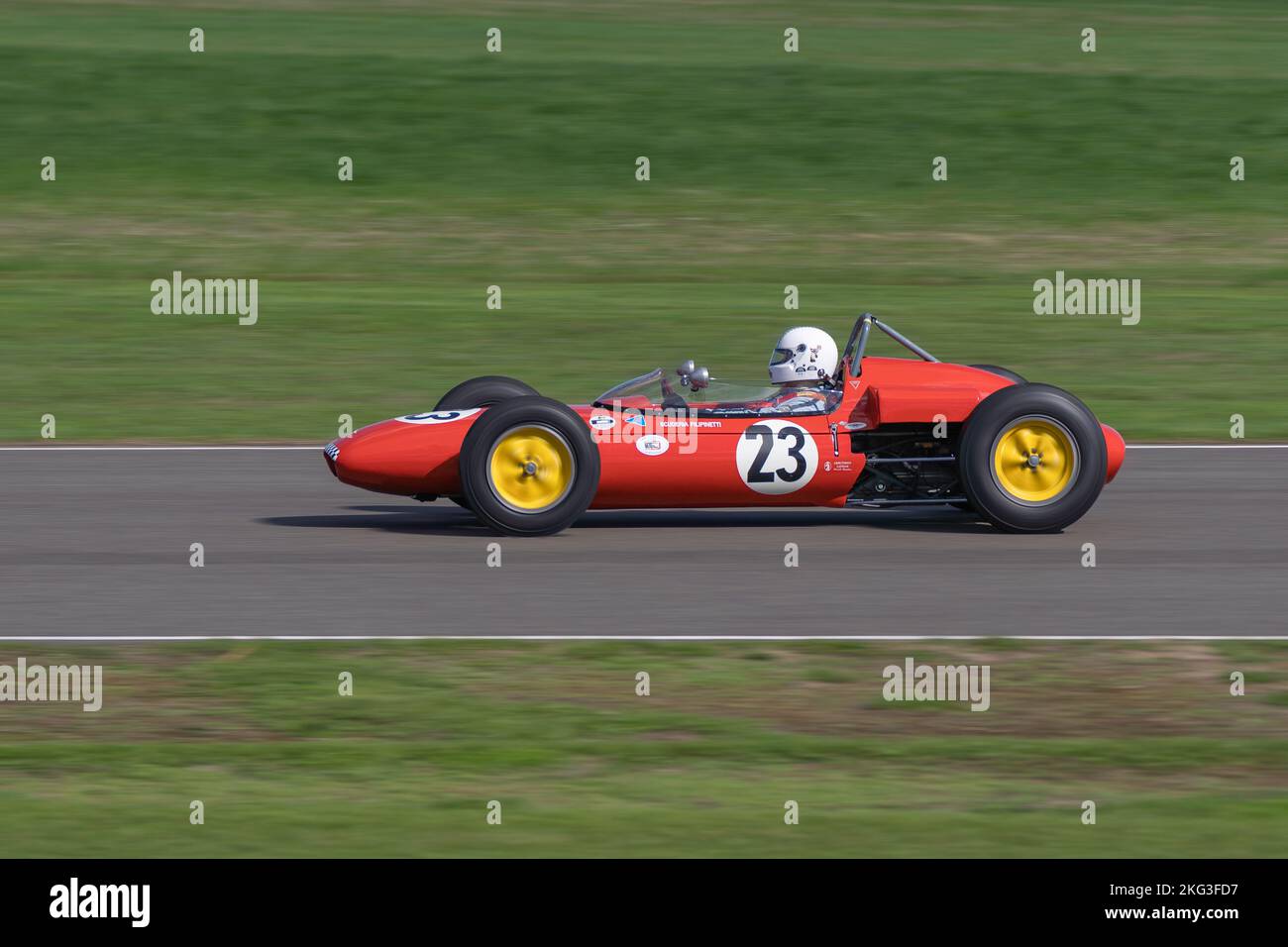 A 1962 Lotus Climax 21/24 racing round Goodwood Motor Circuit during ...