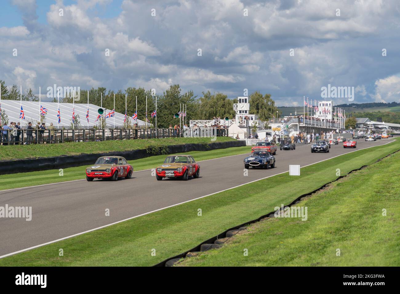 Various vintage cars parade around Goodwood Motor Circuit for the ...