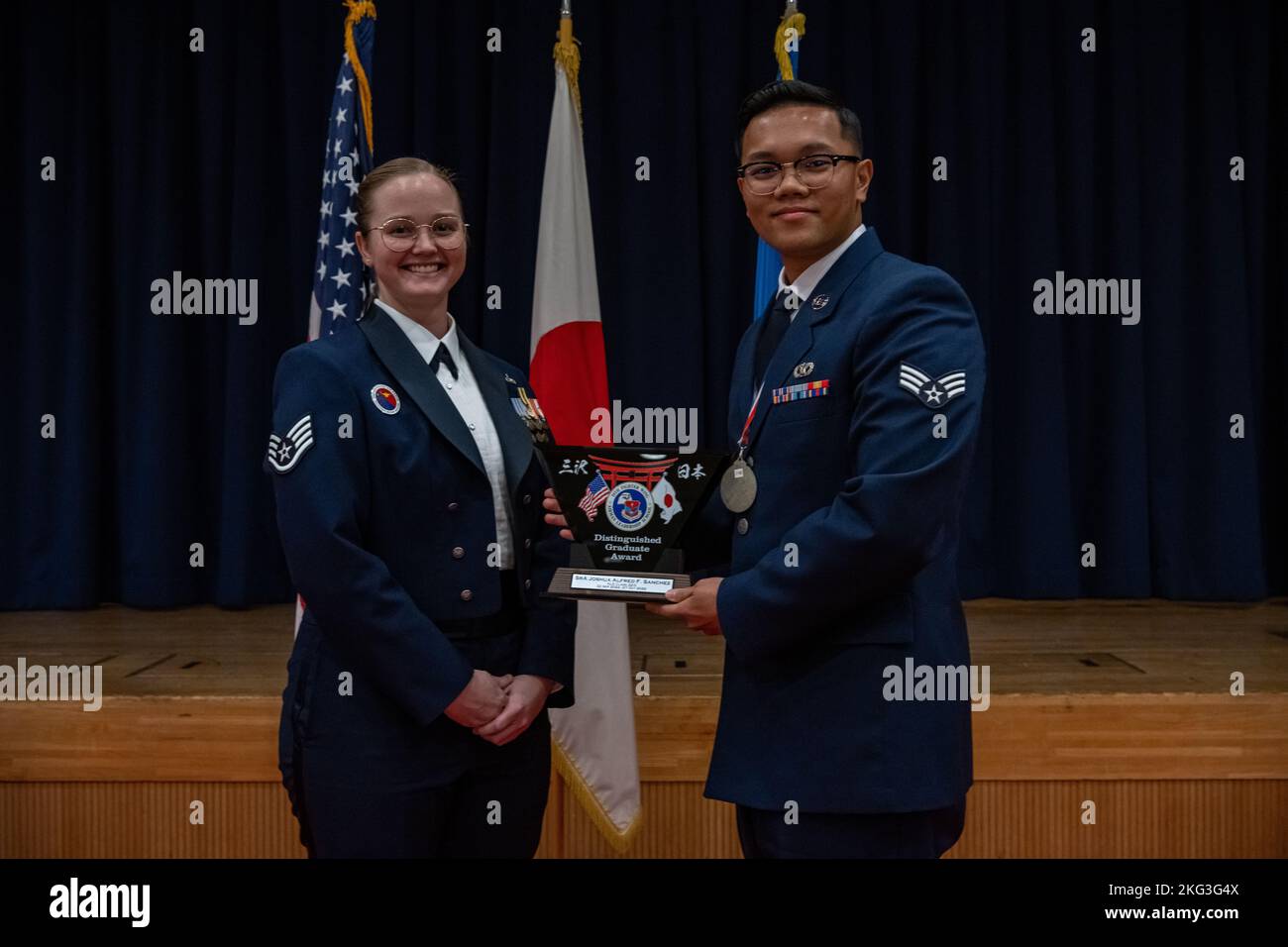 U.S. Air Force Senior Airman Joshua Sanchez, right, Airman Leadership ...