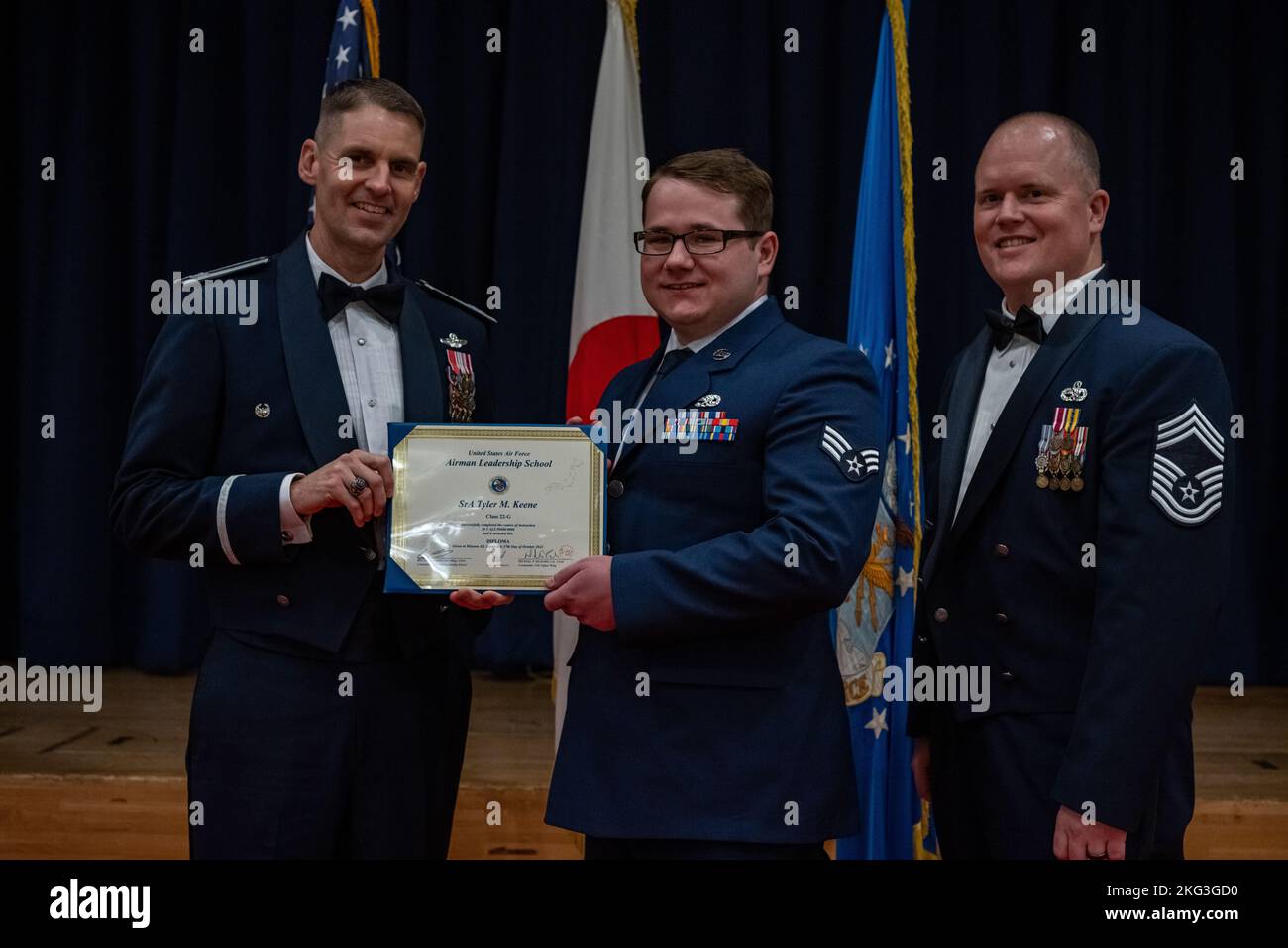 U.S. Air Force Senior Airman Tyler Keene, center, Airman Leadership ...