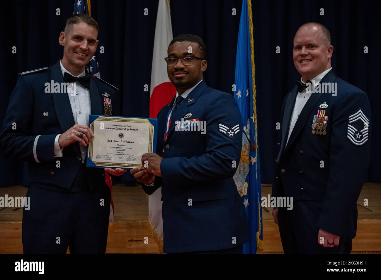 U.S. Air Force Senior Airman Amar Whitaker, center, Airman Leadership ...