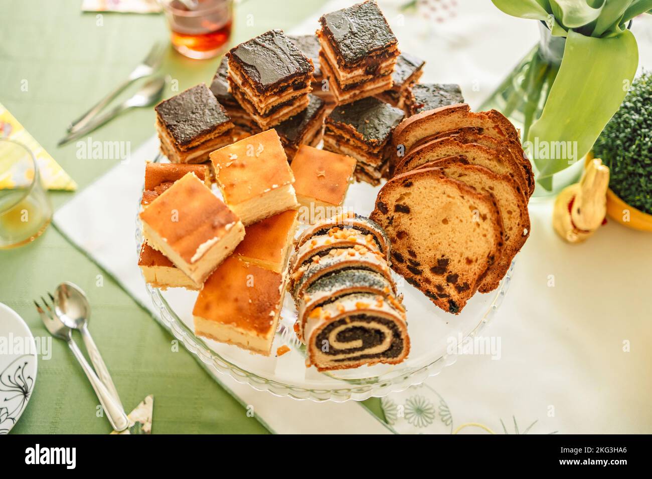 Different type of cakes on a plate and with side light Stock Photo - Alamy
