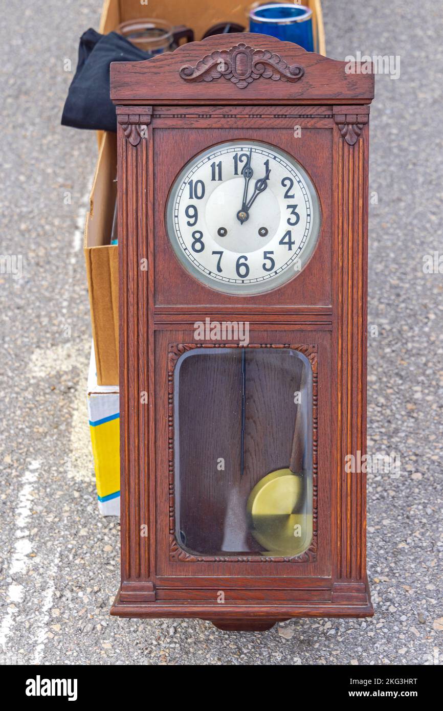 Old Wooden Grandpa Wall Clock With Pendulum at Flea Market Stock Photo ...