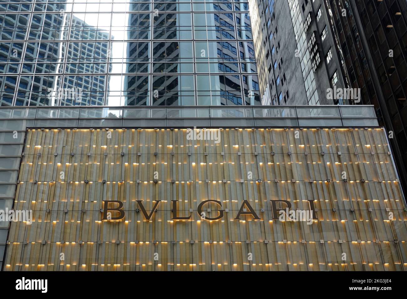 Designer brand BVLGARI exterior store sign surrounded by tower blocks ...