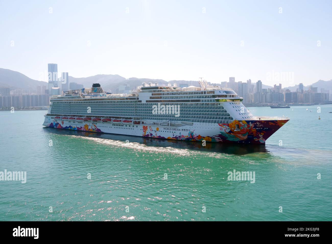 A world dream cruise ship manoeuvres after arriving in Kowloon Bay ...