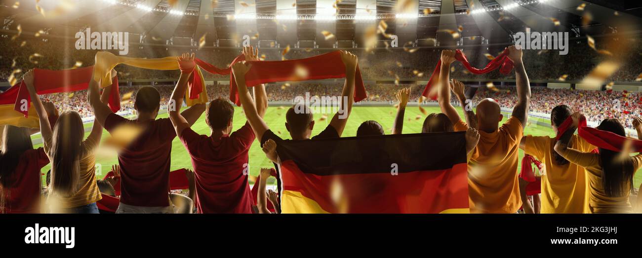 Winner emotions. Back view of football soccer fans cheering their team ...