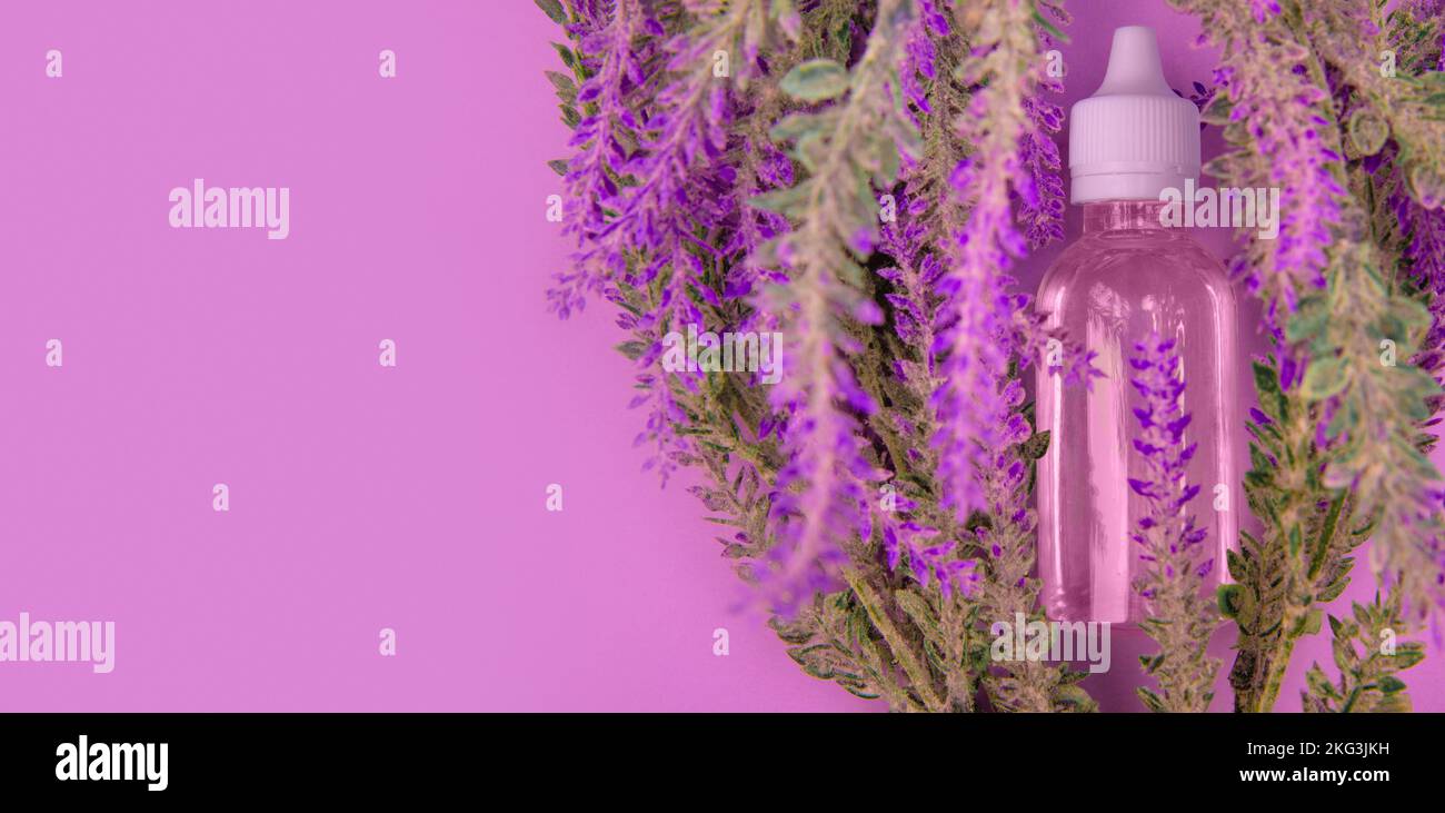 Minimalist mock-up of banner with lavender flowers and lavender extract ...