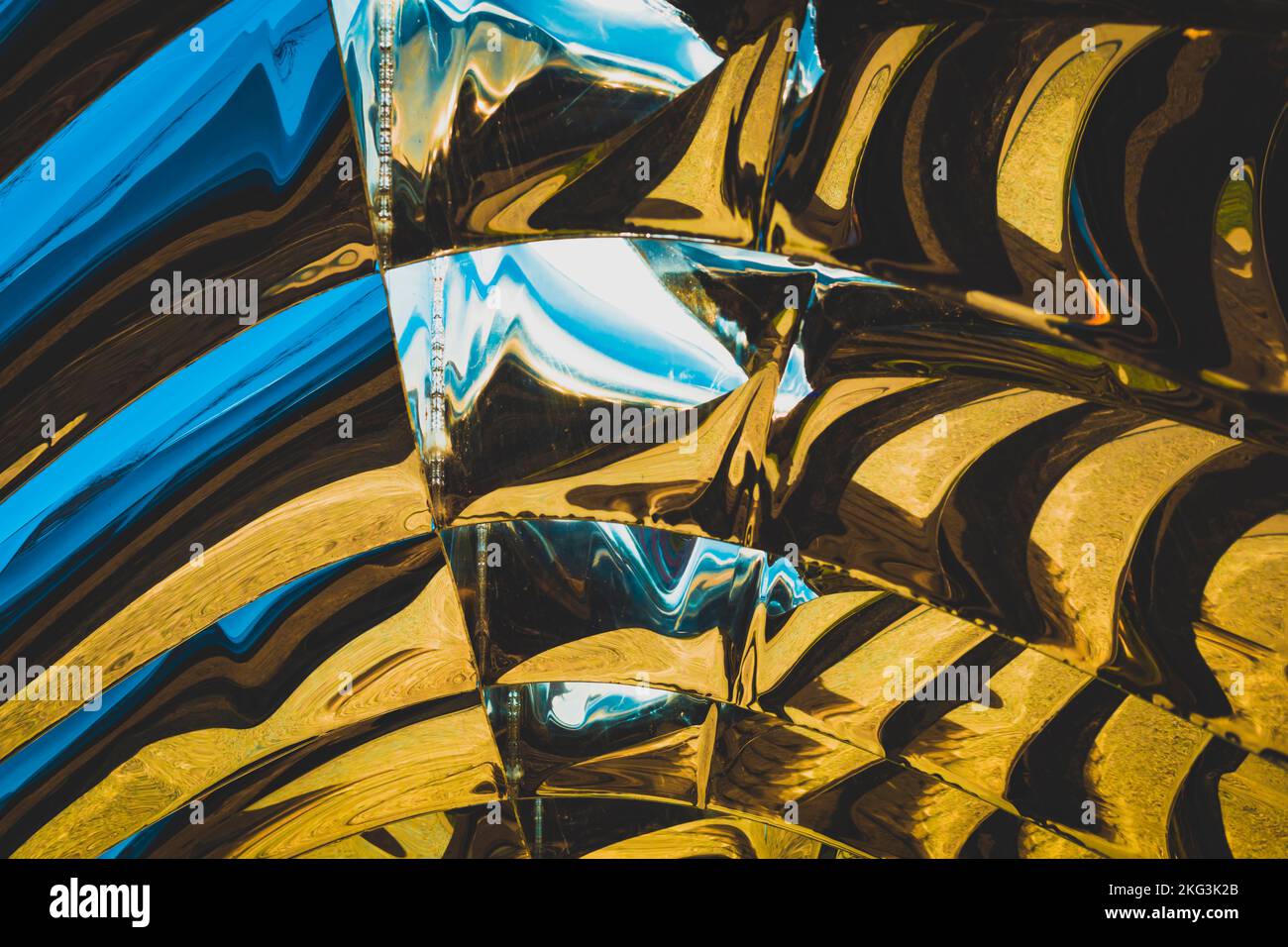 shiny gold metal part of the sculpture Stock Photo - Alamy