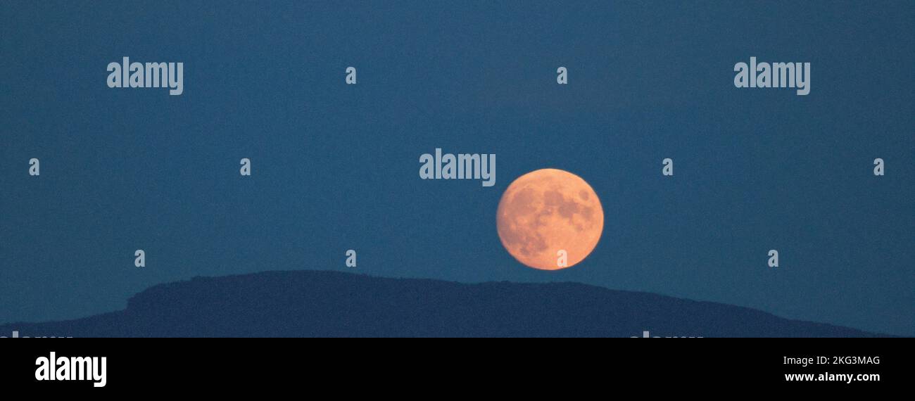 A panoramic view of the full moon in the sky Stock Photo - Alamy