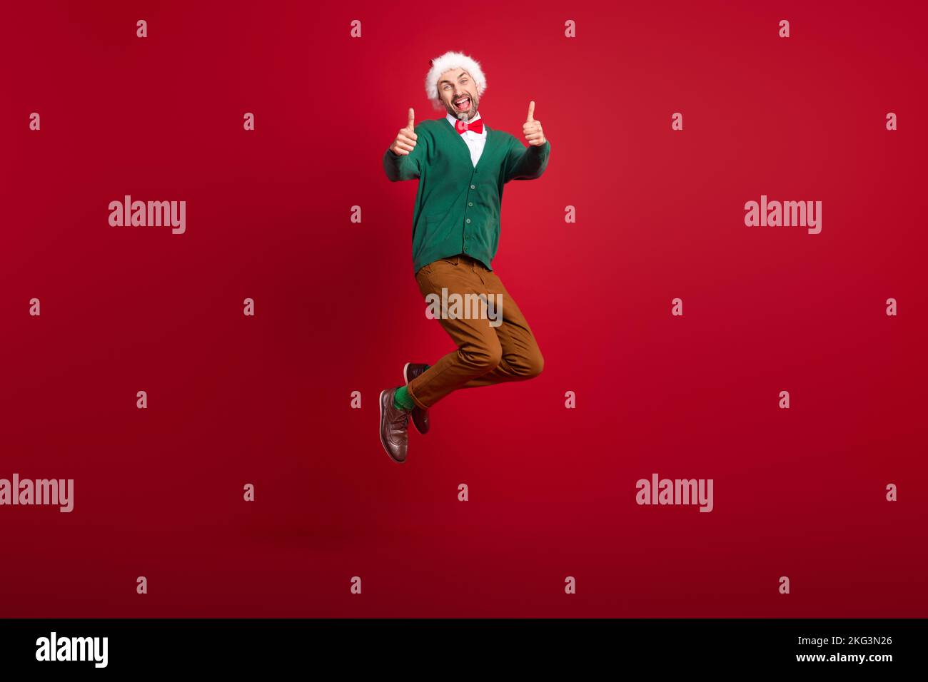 Full body portrait of overjoyed crazy guy jumping hands fingers show ...