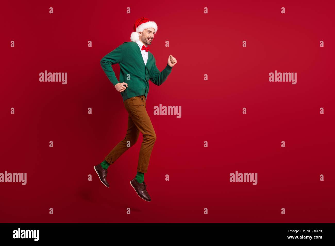 Full length profile portrait of energetic active guy jumping rush empty ...