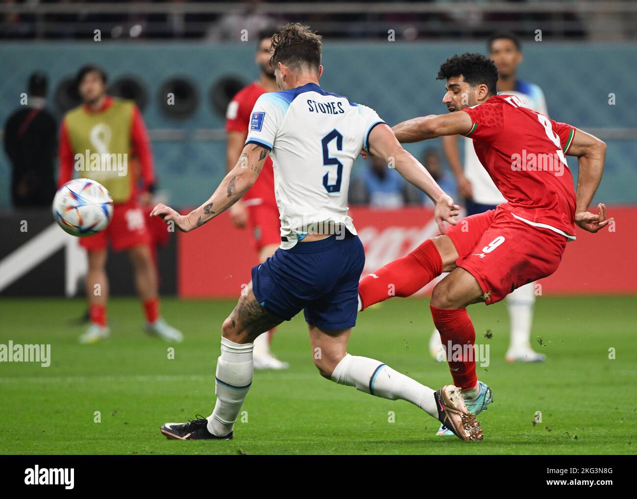 Doha, Qatar. 21st Nov, 2022. Mehdi Taremi (R) of Iran scores during the ...