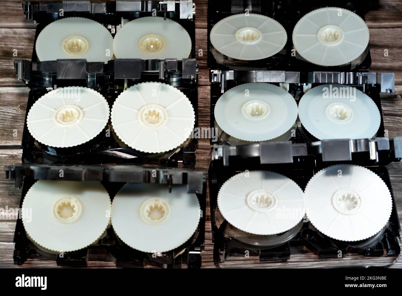 Pile of VHS video cassette tape from inside with the front casing ...