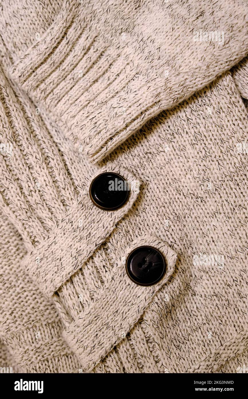 Closeup of Sweater with buttons texture of clothing Stock Photo - Alamy