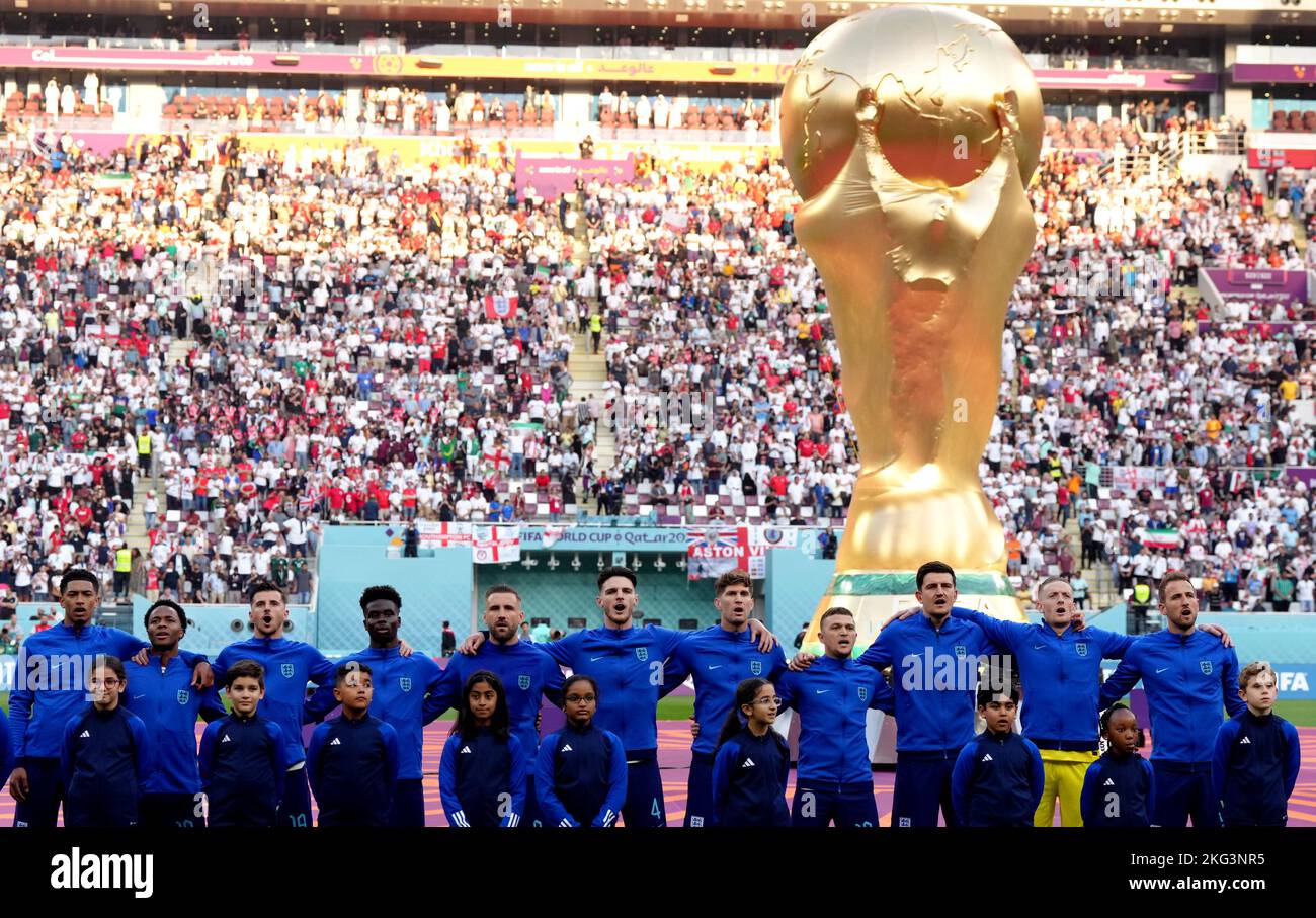 England players with mascot sing the National Anthem ahead of the FIFA ...