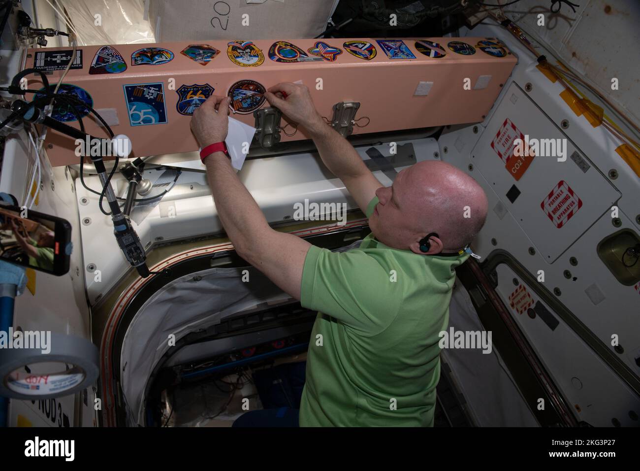 Expedition 67 Commander Oleg Artemyev affixed his mission insignia ...