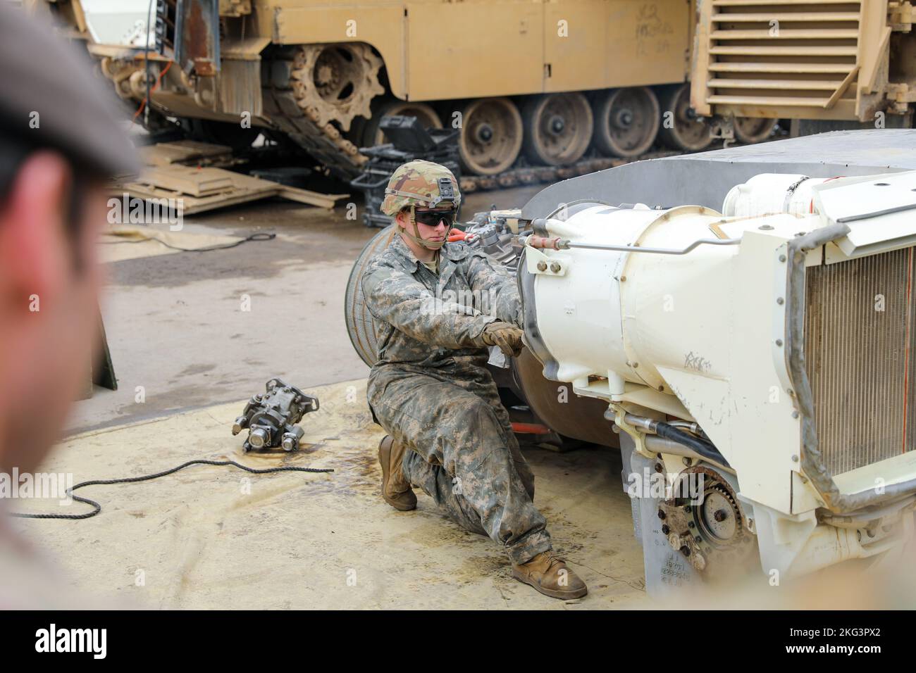 U.S. Army Pfc. Cassandra Schillerberg, an Abrams tank maintainer ...