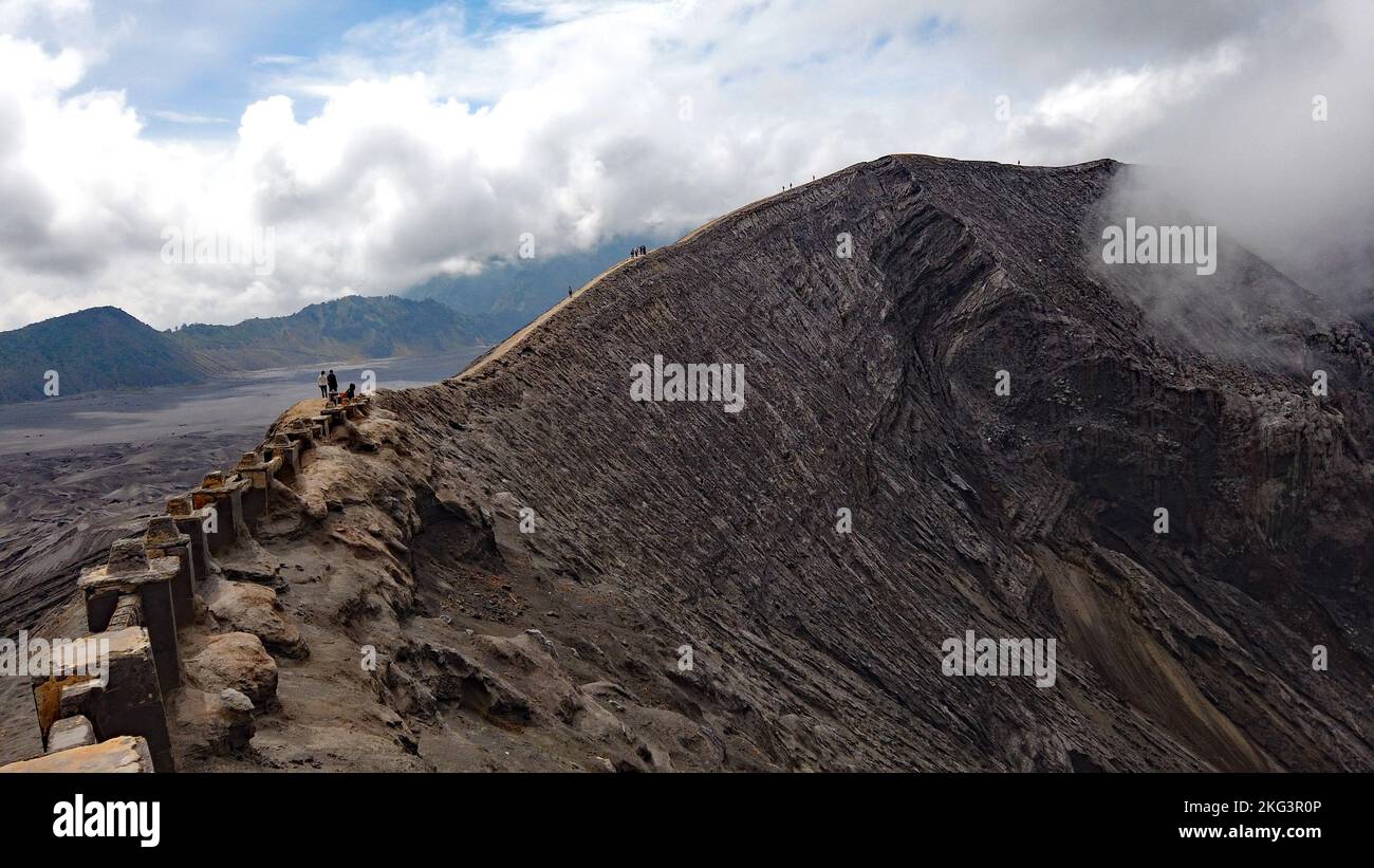 Rim of the caldera of Mount Bromo which is an active somma volcano in ...