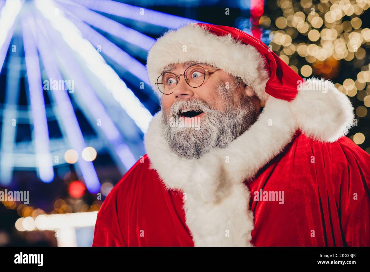 Portrait of astonished positive santa open mouth look curious ...