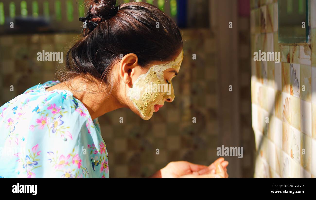 Beautiful indian woman washing face hi-res stock photography and images ...