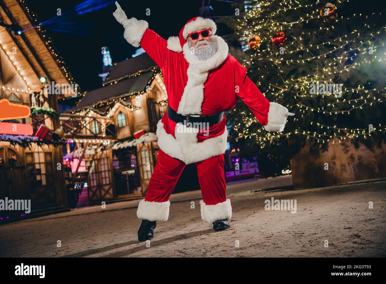 Full length portrait of excited positive grandfather santa point ...
