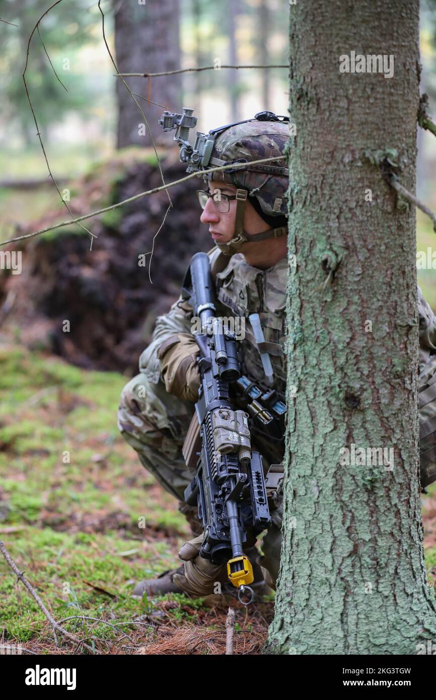 U.S. Army Pfc. Larry Larralde, an infantry rifle-man assigned to Chaos Company, 3rd Battalion ...