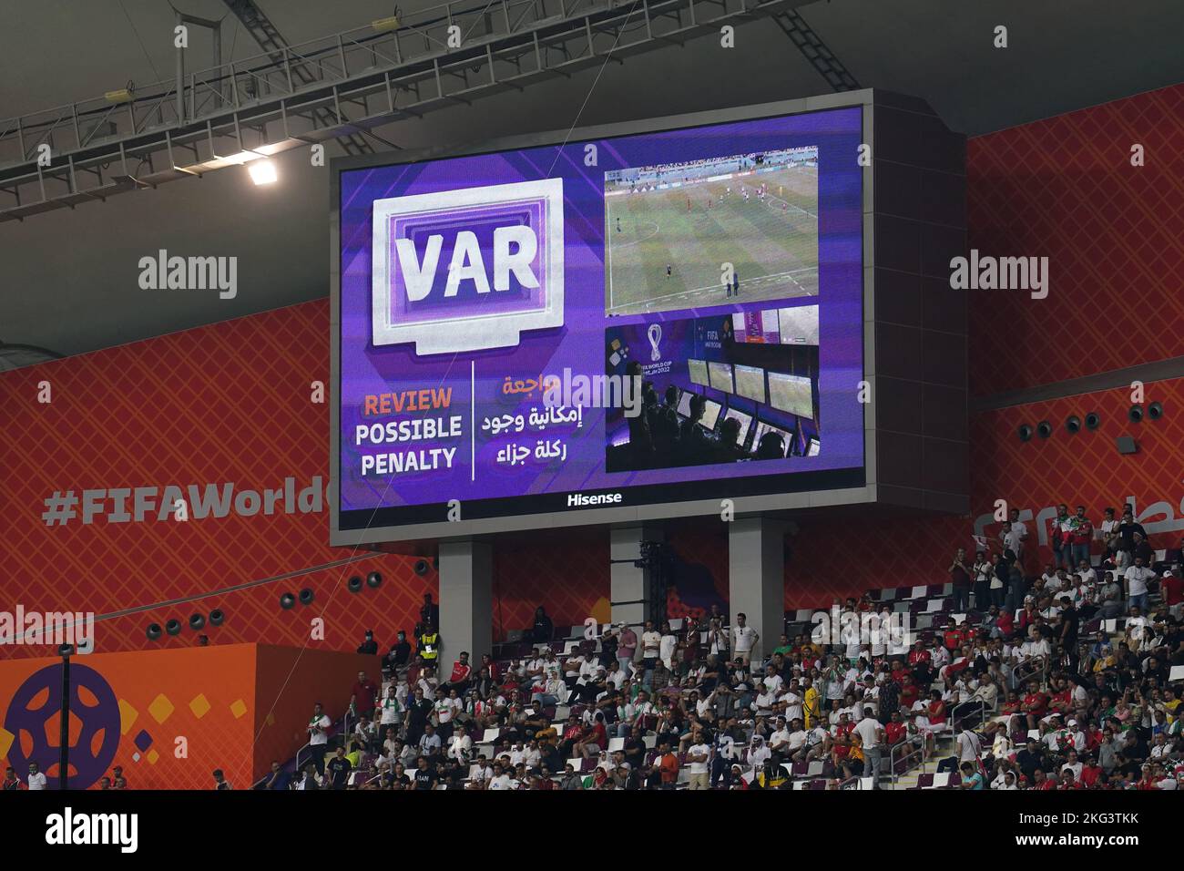 The big screen indicates that VAR is reviewing a possible foul, before ...