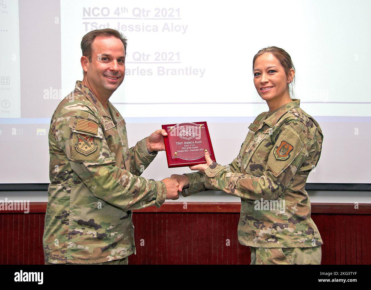 Col. Kyle Goldstein, 340th Flying Training Group commander, presents ...