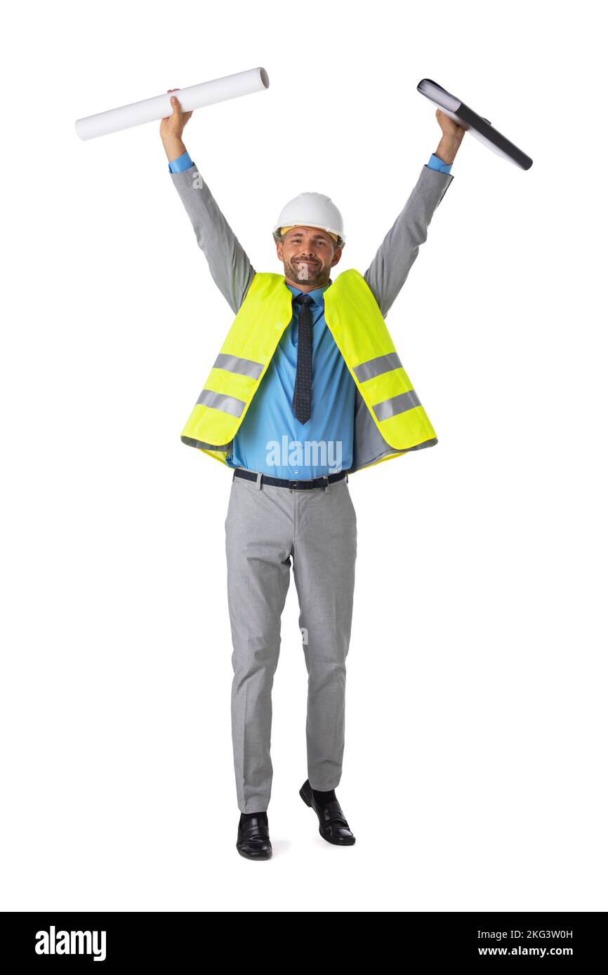 Full length portrait of a male engineer with arms raised holding a ...
