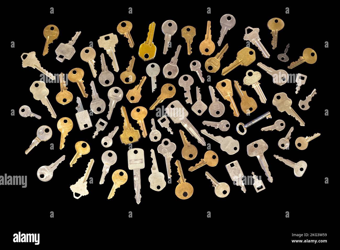Top aerial view of a group of many different keys in a random pattern ...