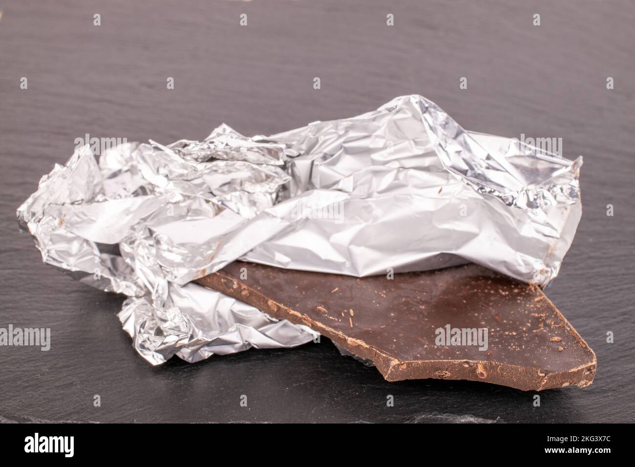 Dark chocolate on paper hi-res stock photography and images - Alamy