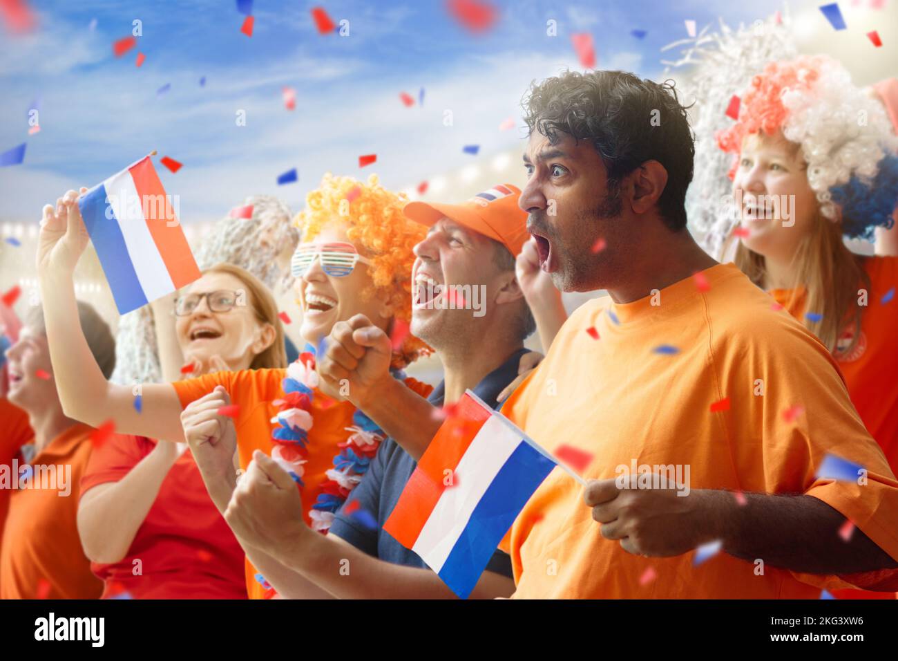 Netherlands football supporter on stadium. Dutch fans on soccer pitch ...