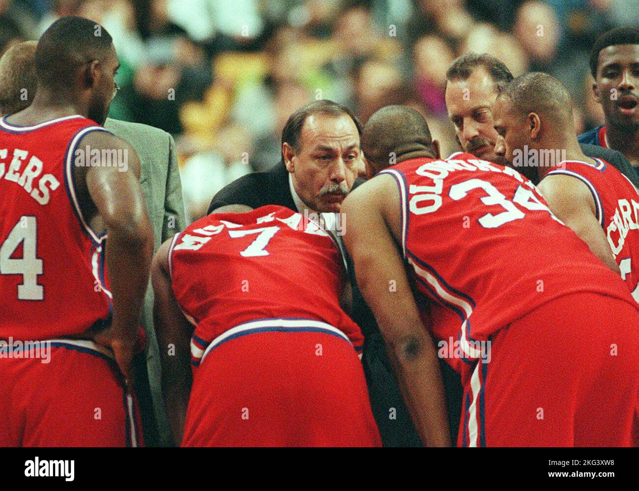 COACH CHRIS FORD TALKS WITH HIS TEAM DURING A TIME OUT IN THE 4TH QT ...
