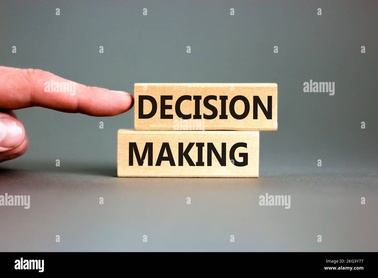 Decision making symbol. Concept words Decision making on wooden blocks ...