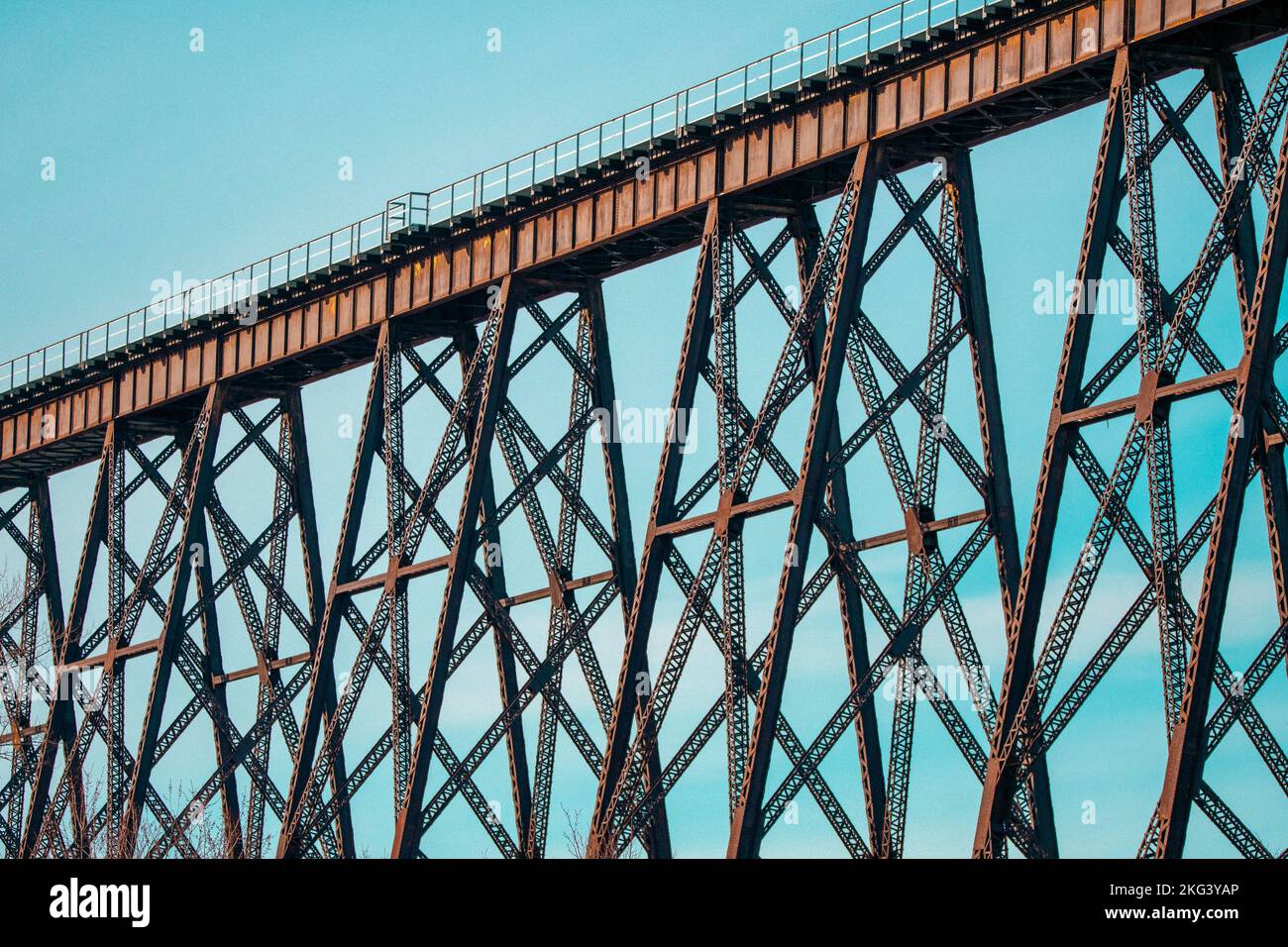 A skyline of Lethbridge Viaduct bridge, formerly the High Level bridge against a blue sky in ...